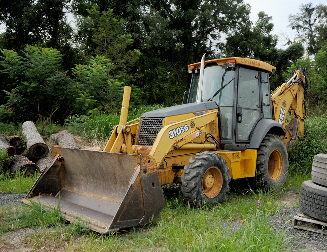 Backhoe Rental - Zartman Construction, Inc.